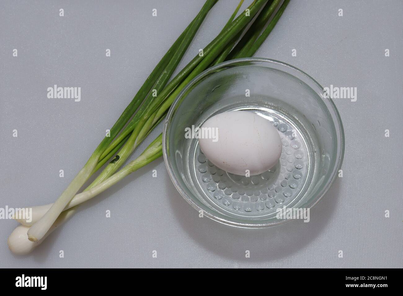 Closeup on spring onion roots hi-res stock photography and images - Alamy