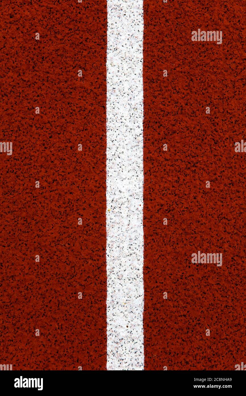 Closeup of the red stadium running track Stock Photo - Alamy