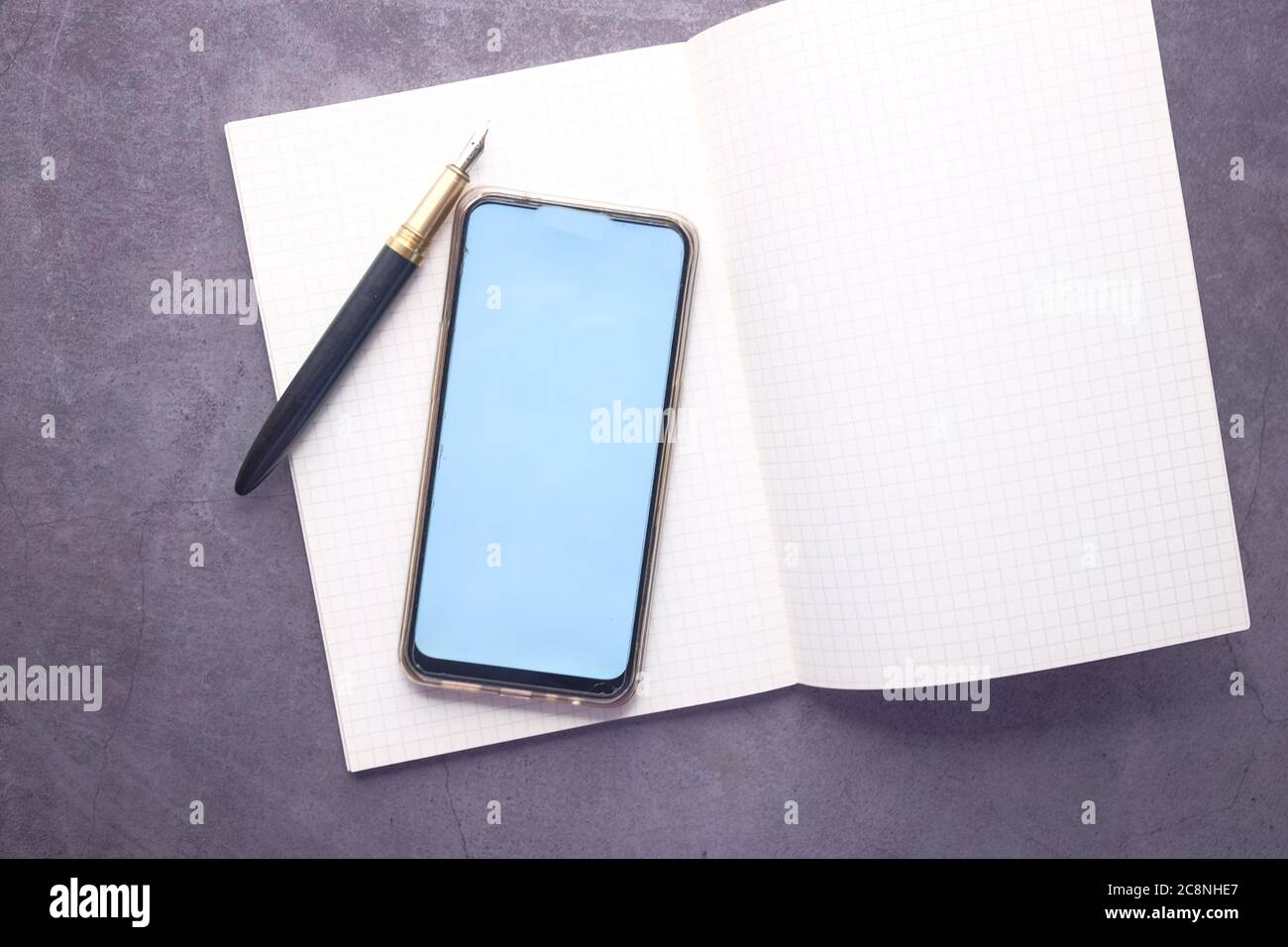 smart phone with white screen on notepad Stock Photo - Alamy