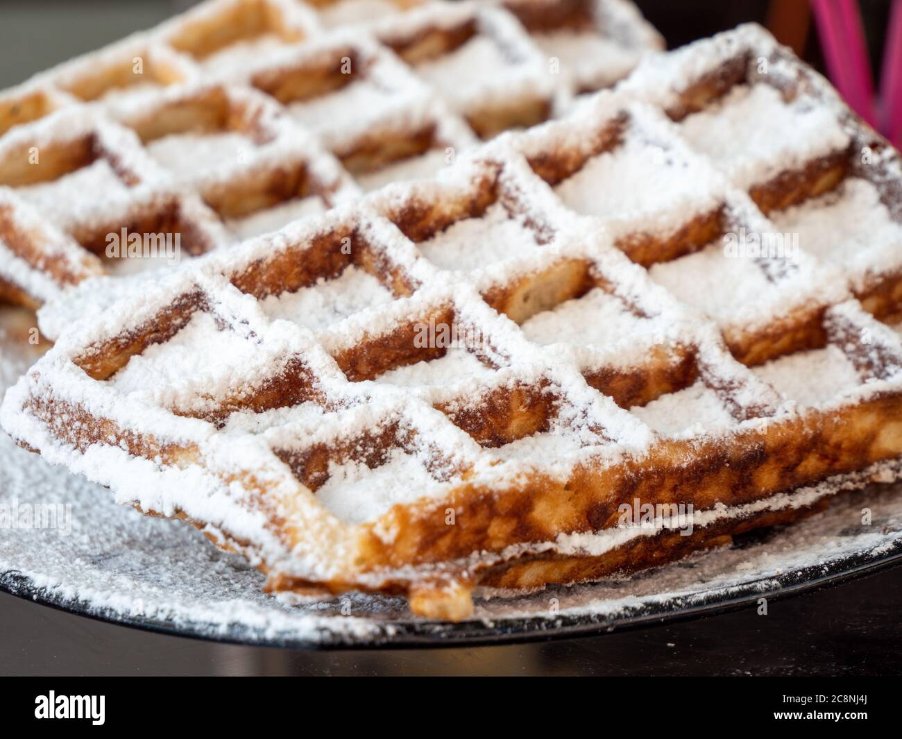 sweet waffle with powdered sugar Stock Photo - Alamy