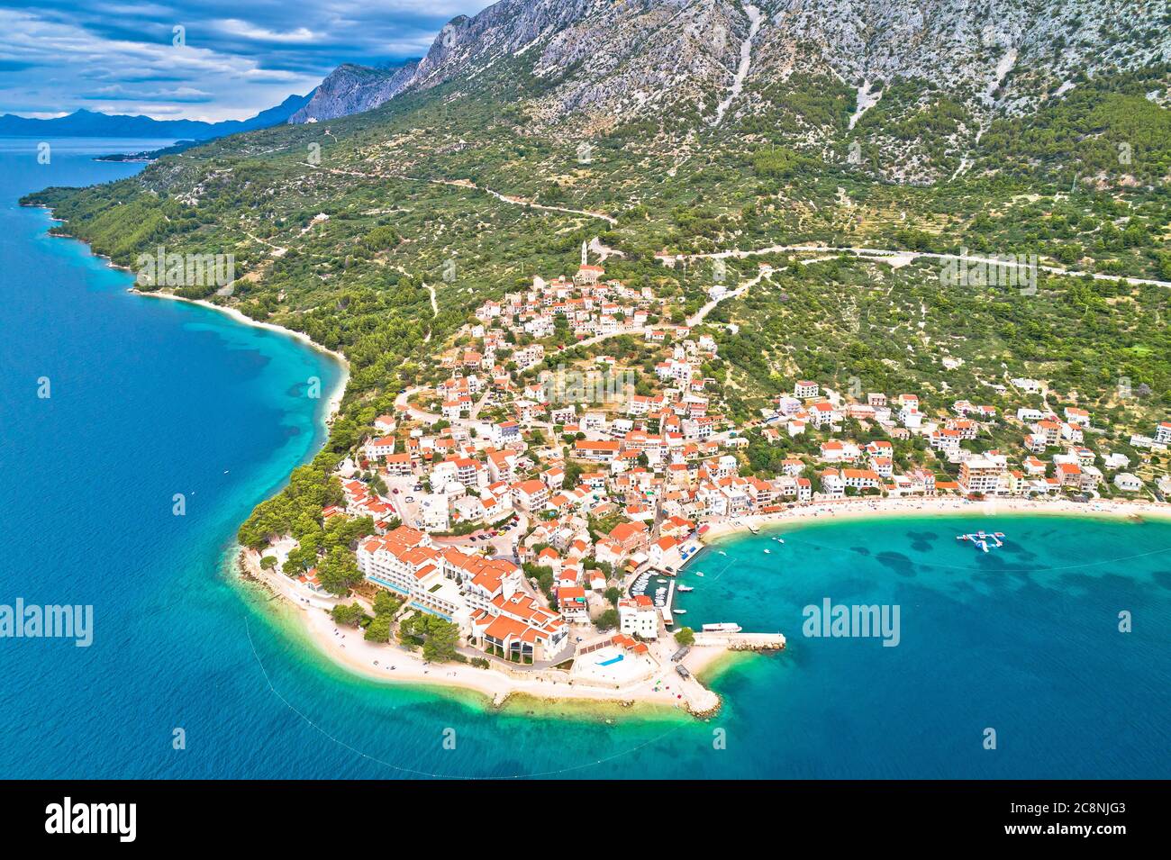Igrane village on Makarska riviera and Biokovo mountain aerial view ...