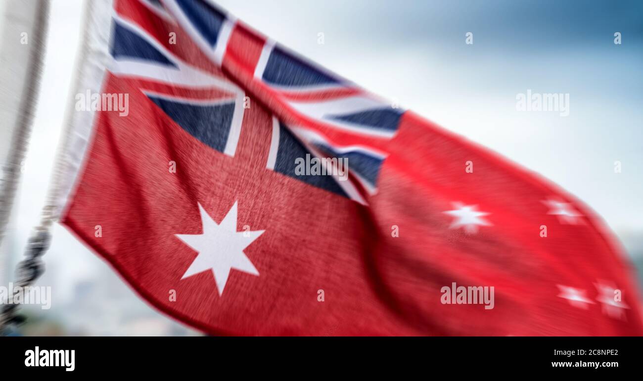 Australian flag waving at the wind Stock Photo - Alamy