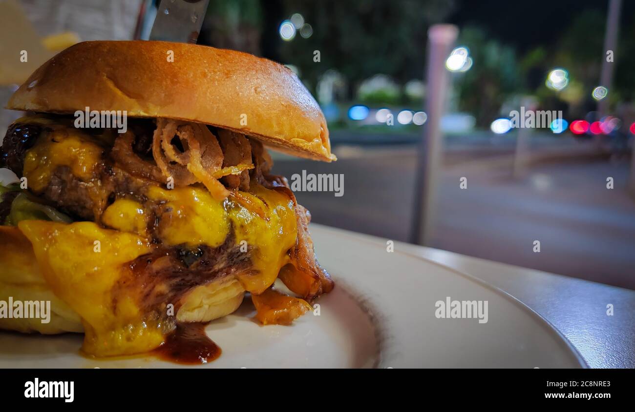 Giant Burger at a street restaurant Stock Photo - Alamy