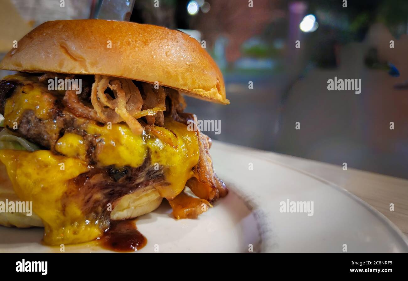 Giant Burger at a street restaurant Stock Photo - Alamy