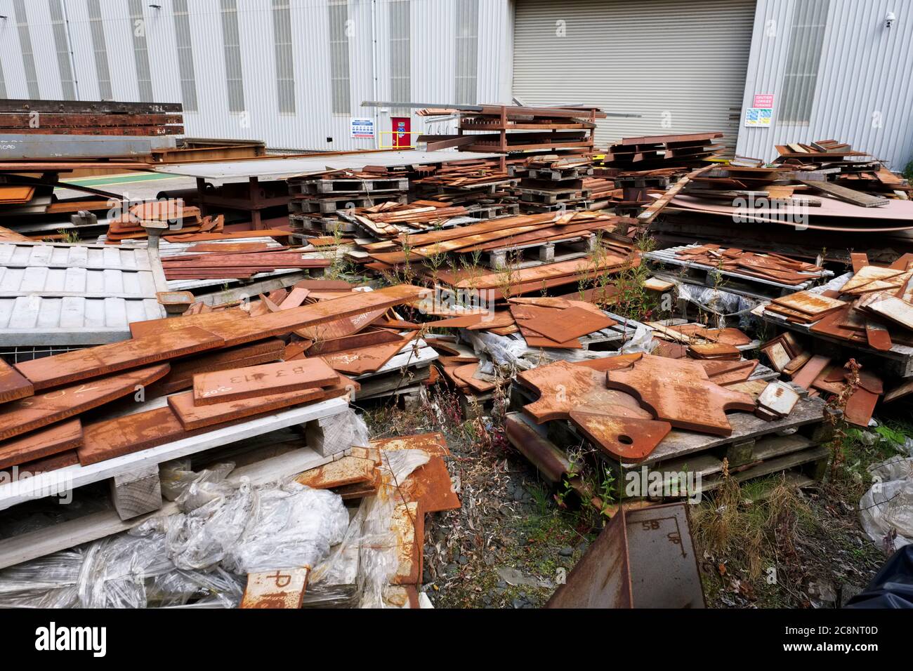 Scrap metal yard stack of steel and iron girders and plates Stock Photo ...
