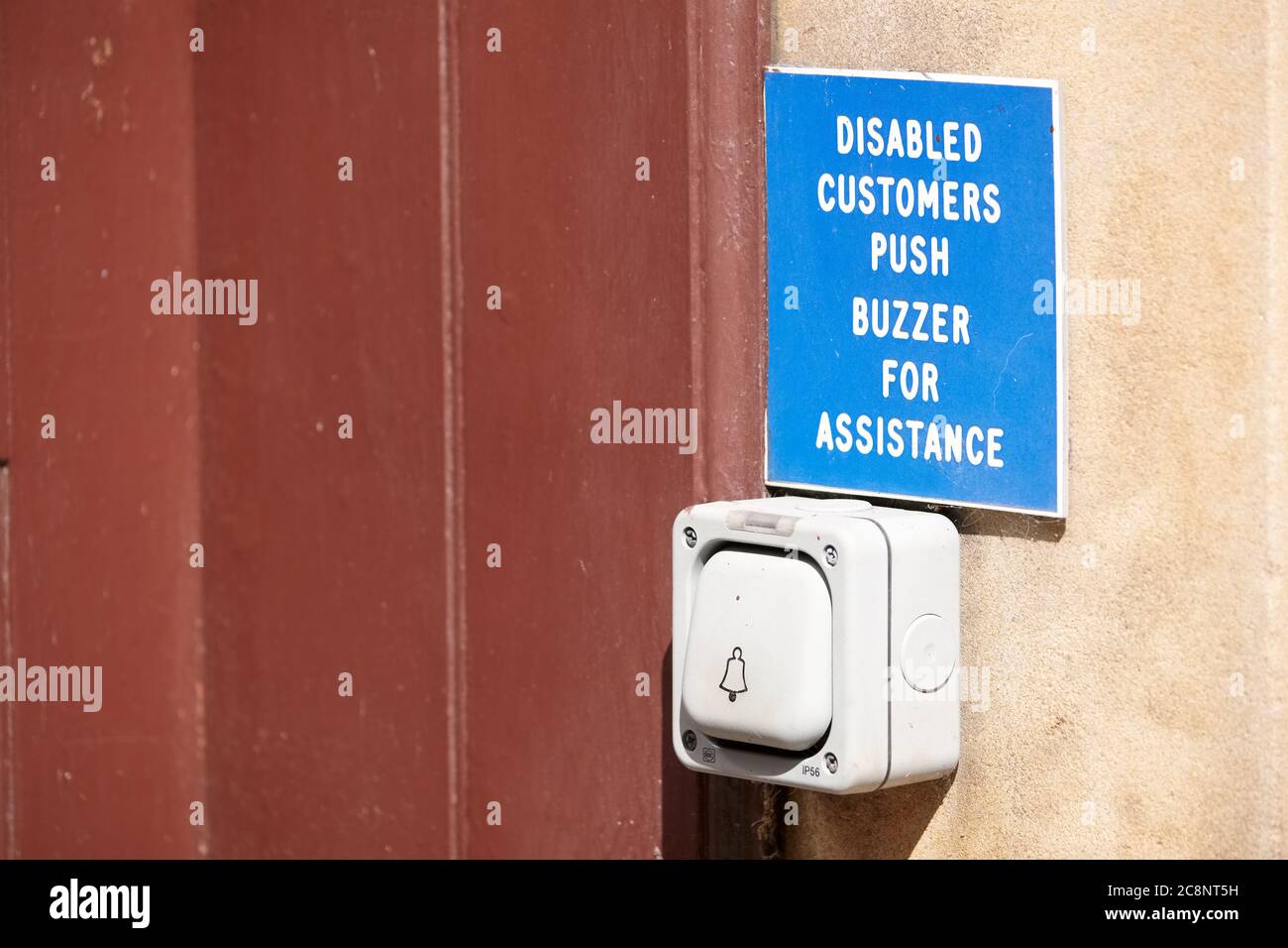 Disabled accessible push button buzzer for assistance sign at shop ...