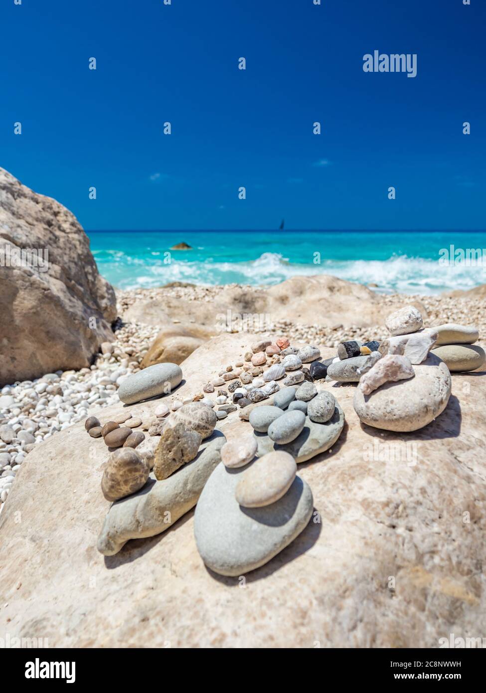 Zen Balanced stones at the beach Stock Photo - Alamy