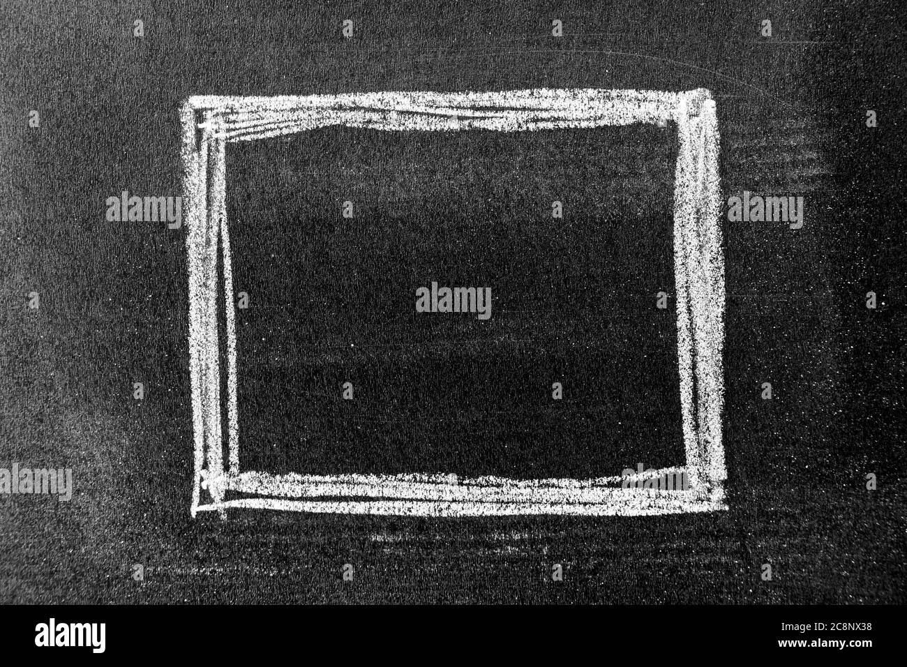 White chalk hand drawing in square or banner shape on black board ...