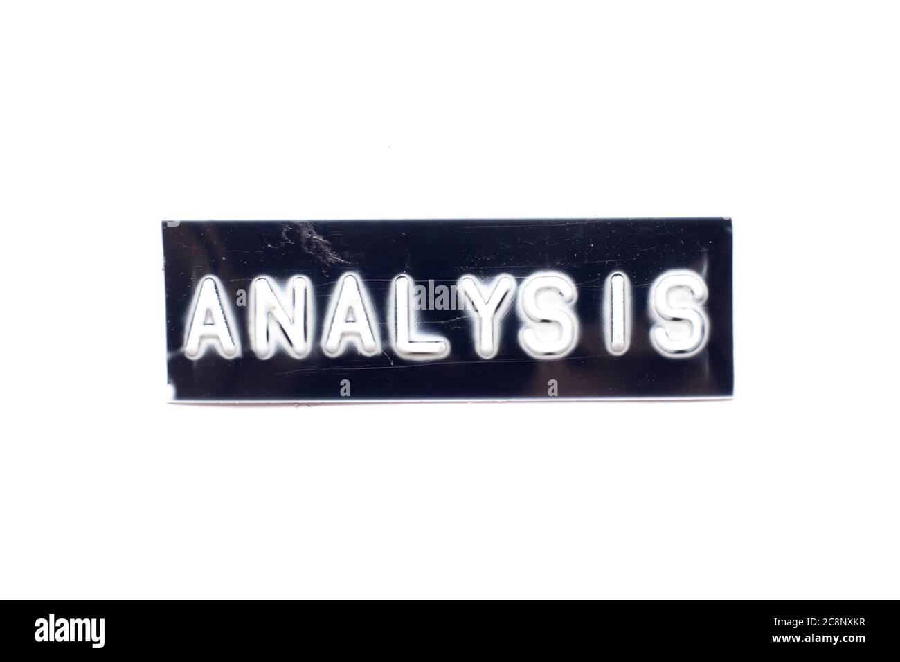 Embossed letter in word analysis in black banner on white background ...