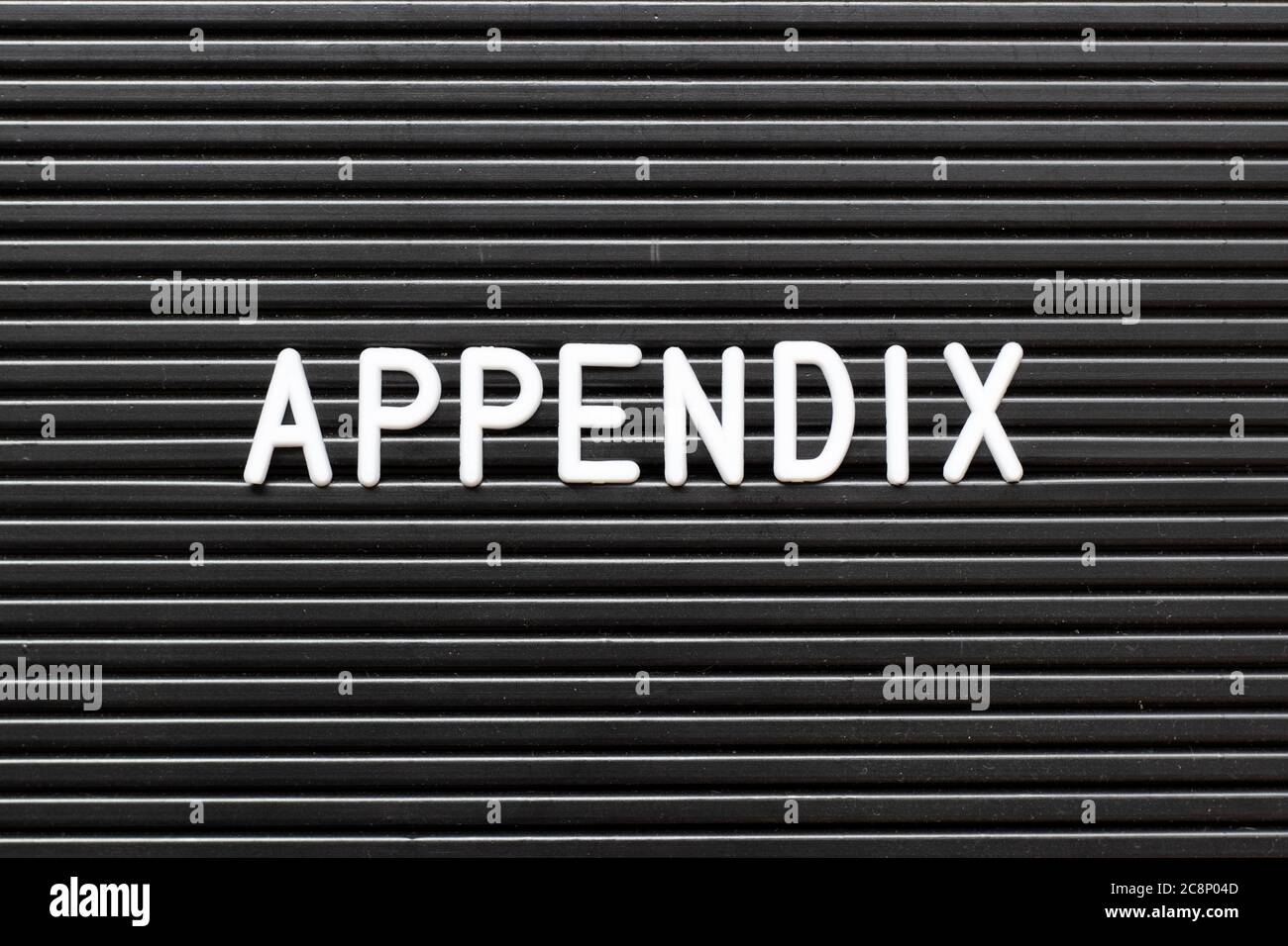 Black felt board with white alphabet in word appendix background Stock ...