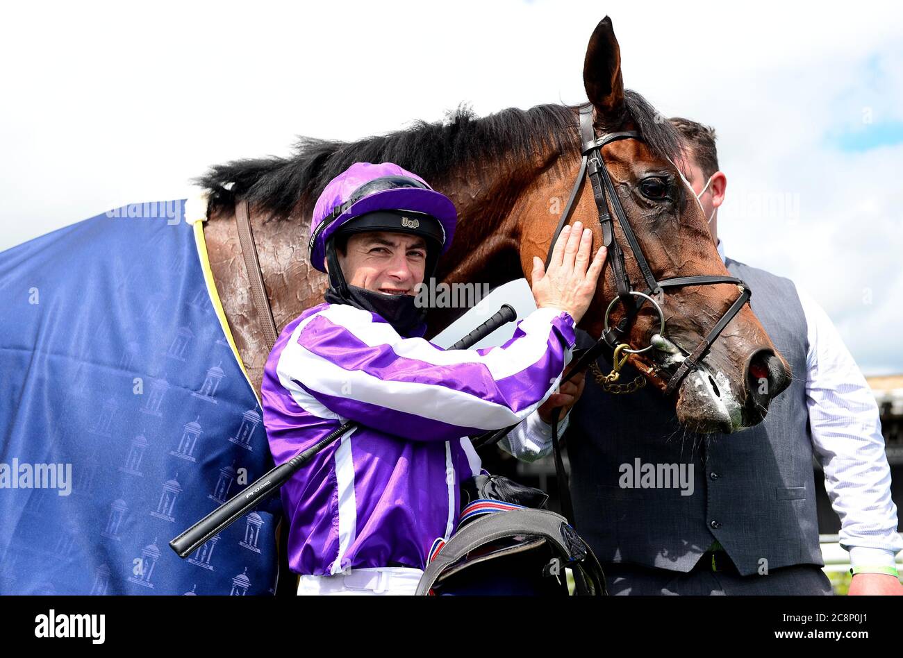 Jockey Wayne Lordan celebrates with Magical in the winners enclosure ...