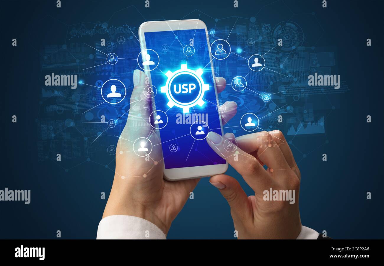 Female hand holding smartphone with USP abbreviation, modern technology ...