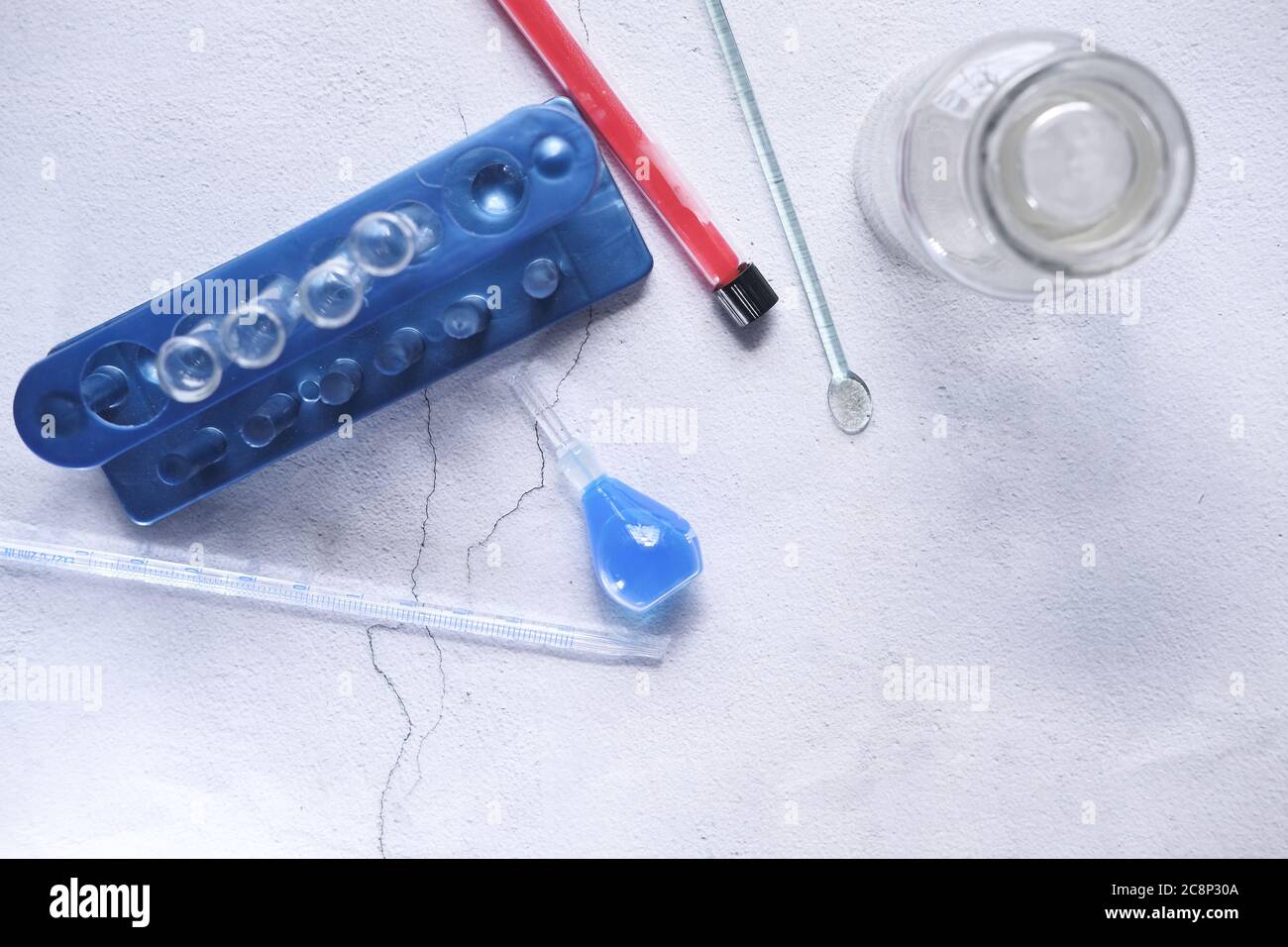 Top view of blood test tube and laboratory equipment on table Stock ...