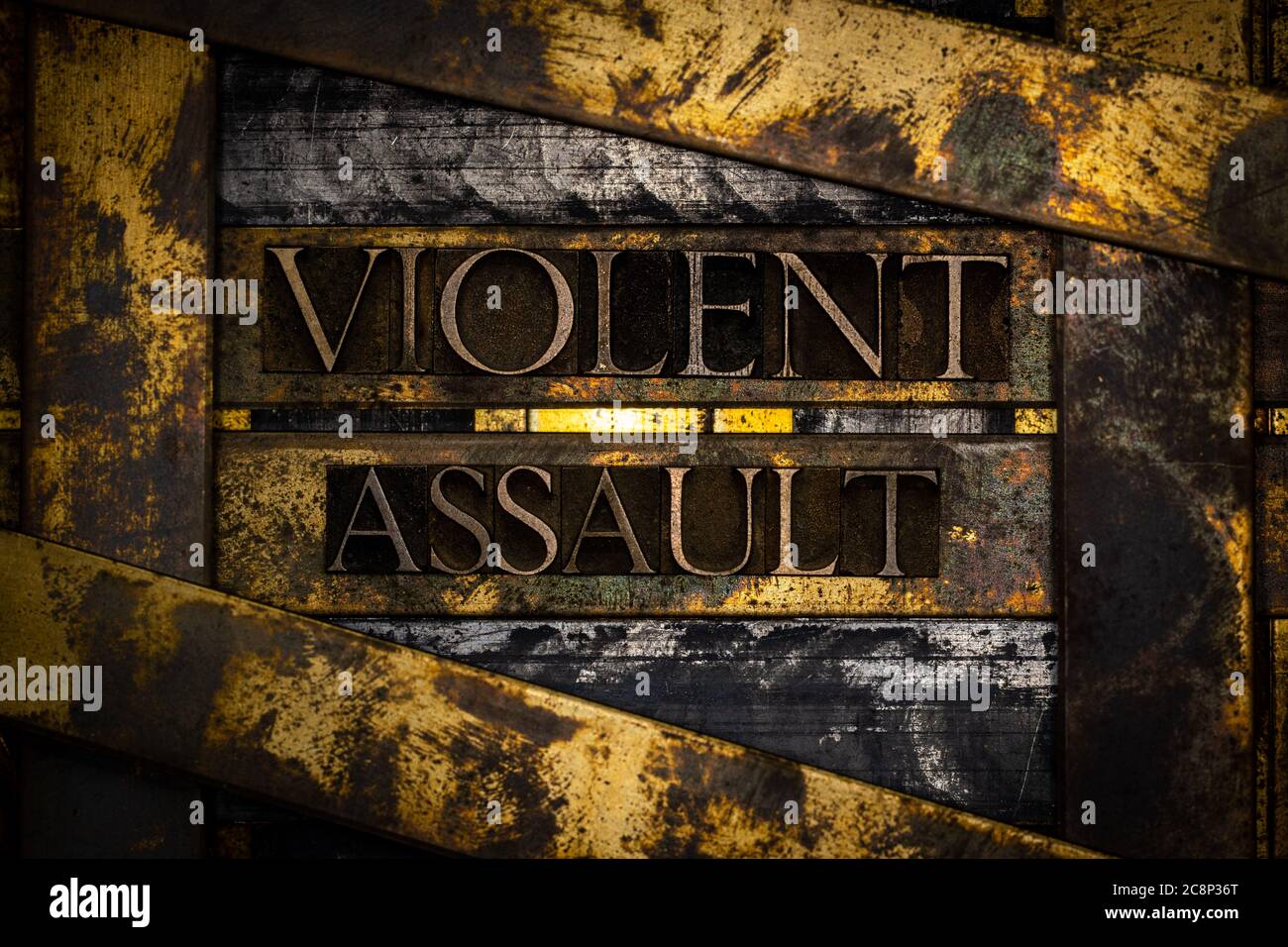Violent Assault text formed with real authentic typeset letters on ...
