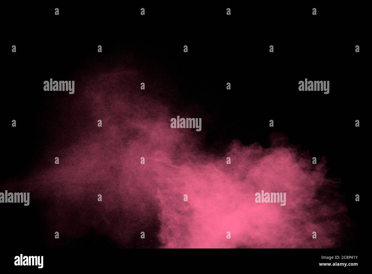 Pink dust particles splash on black background.Pink powder splash Stock ...