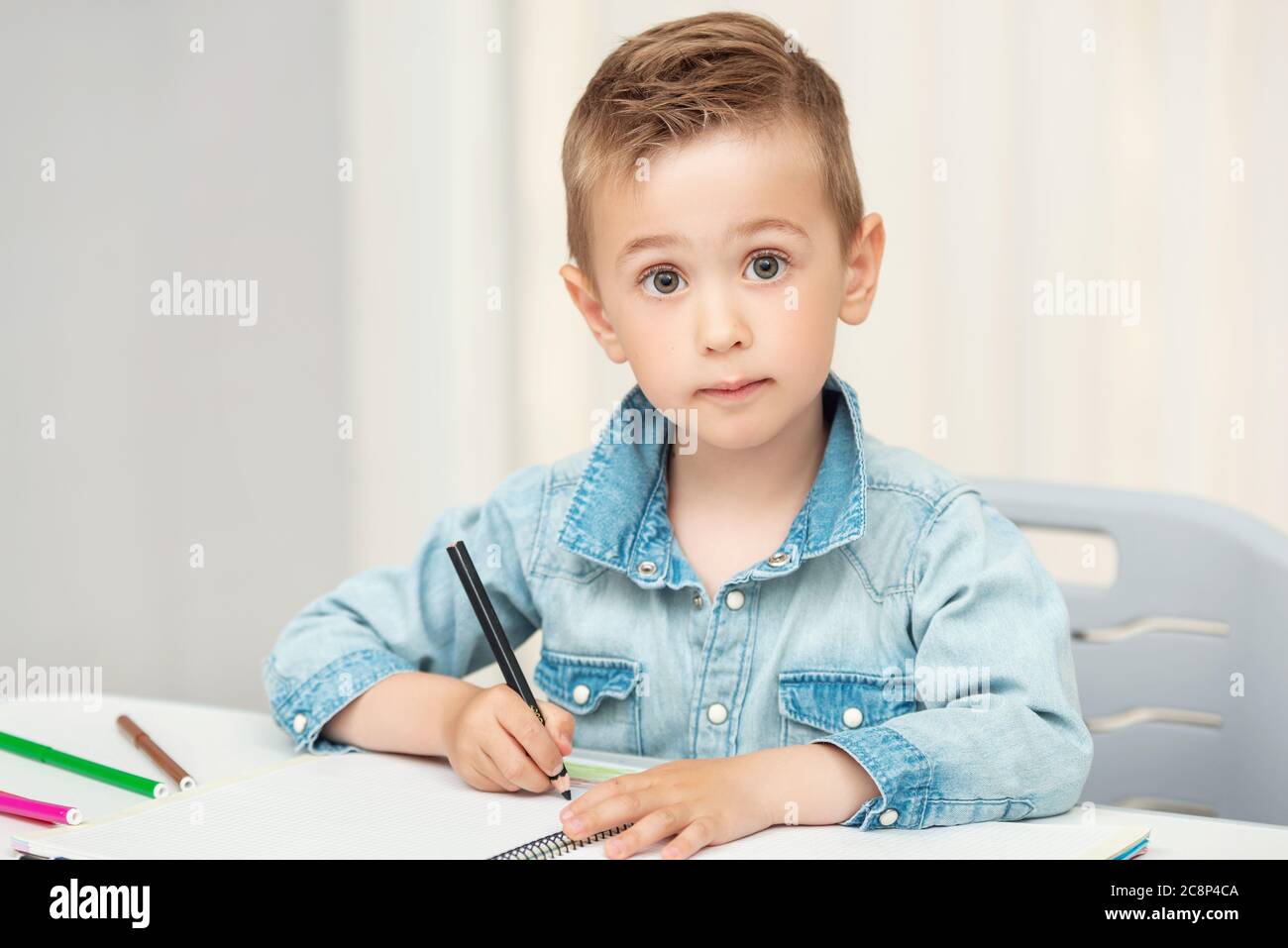 Kid self isolation, Home schooling, Social Distance Stock Photo - Alamy