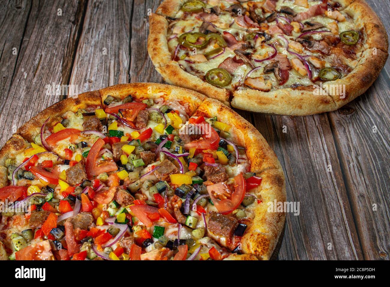 Two different pizza hi-res stock photography and images - Alamy