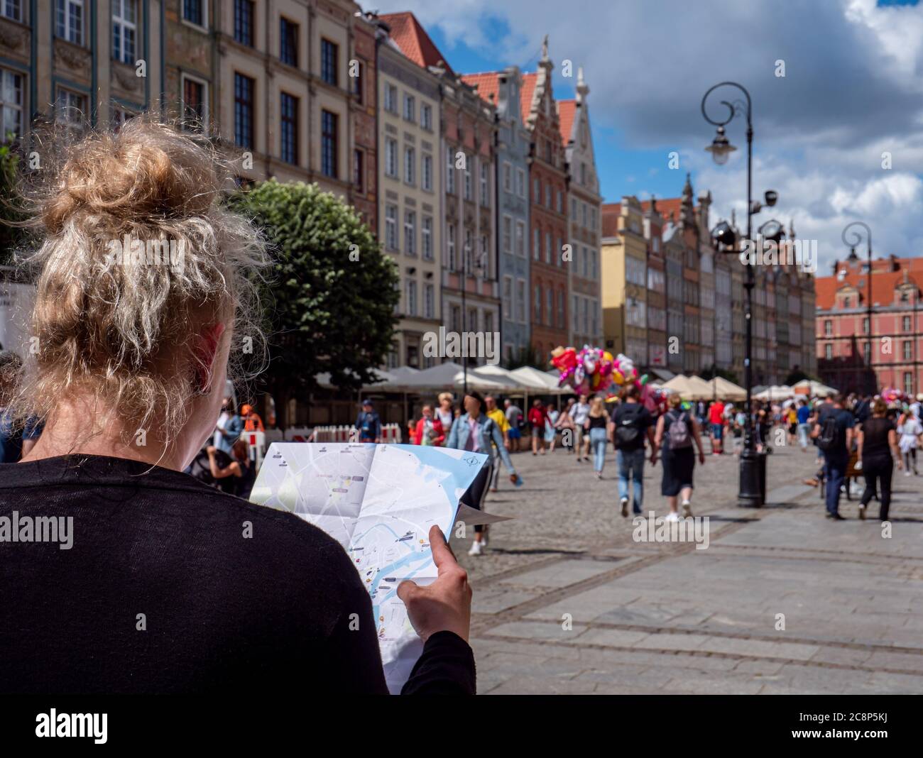 people walking in the city tourism in gdansk poland Stock Photo - Alamy