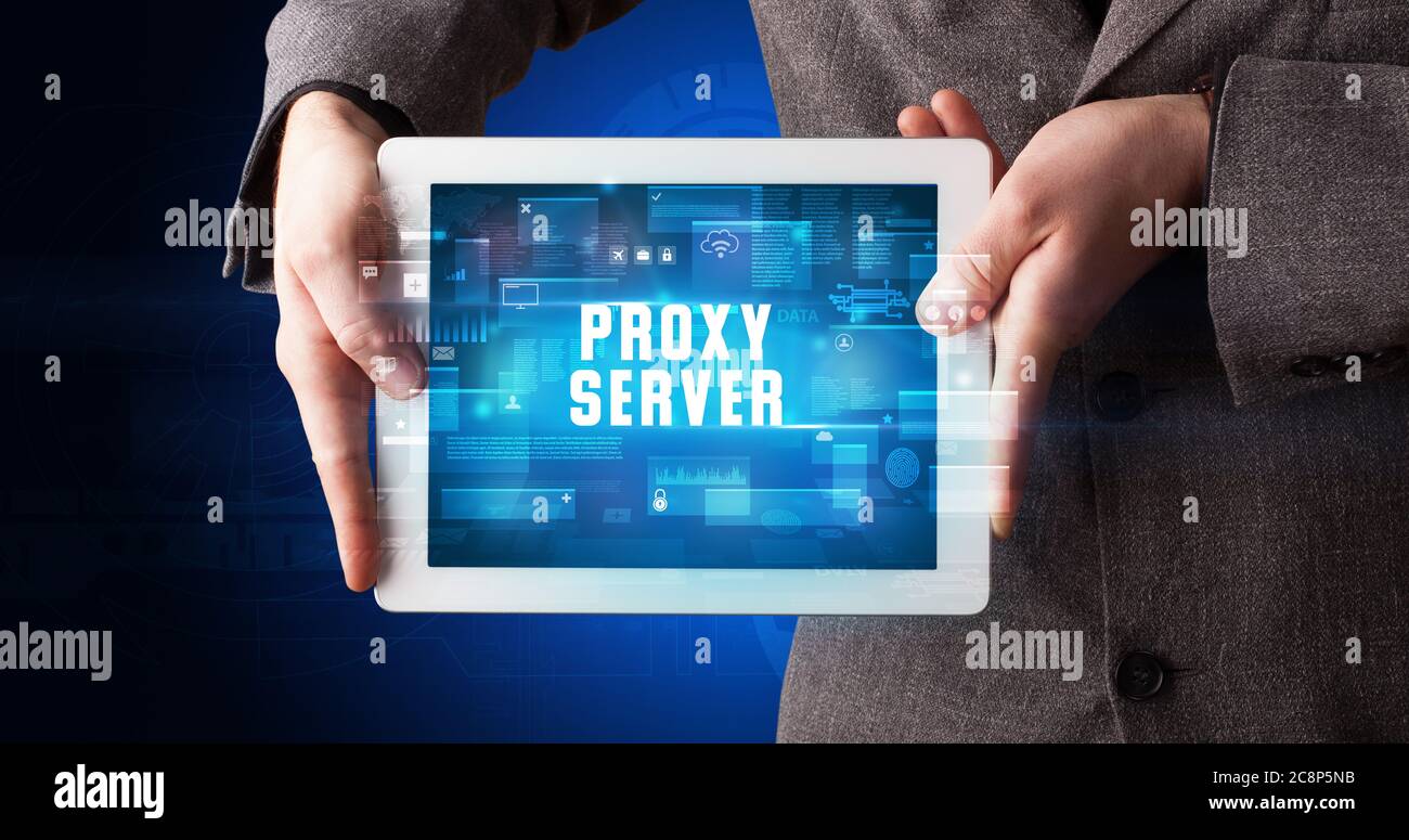 Young business person working on tablet and shows the digital sign ...