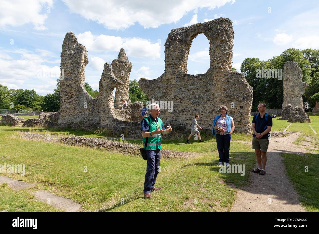 A Blue Badge tour guide talks to socially distanced tourists in the ...