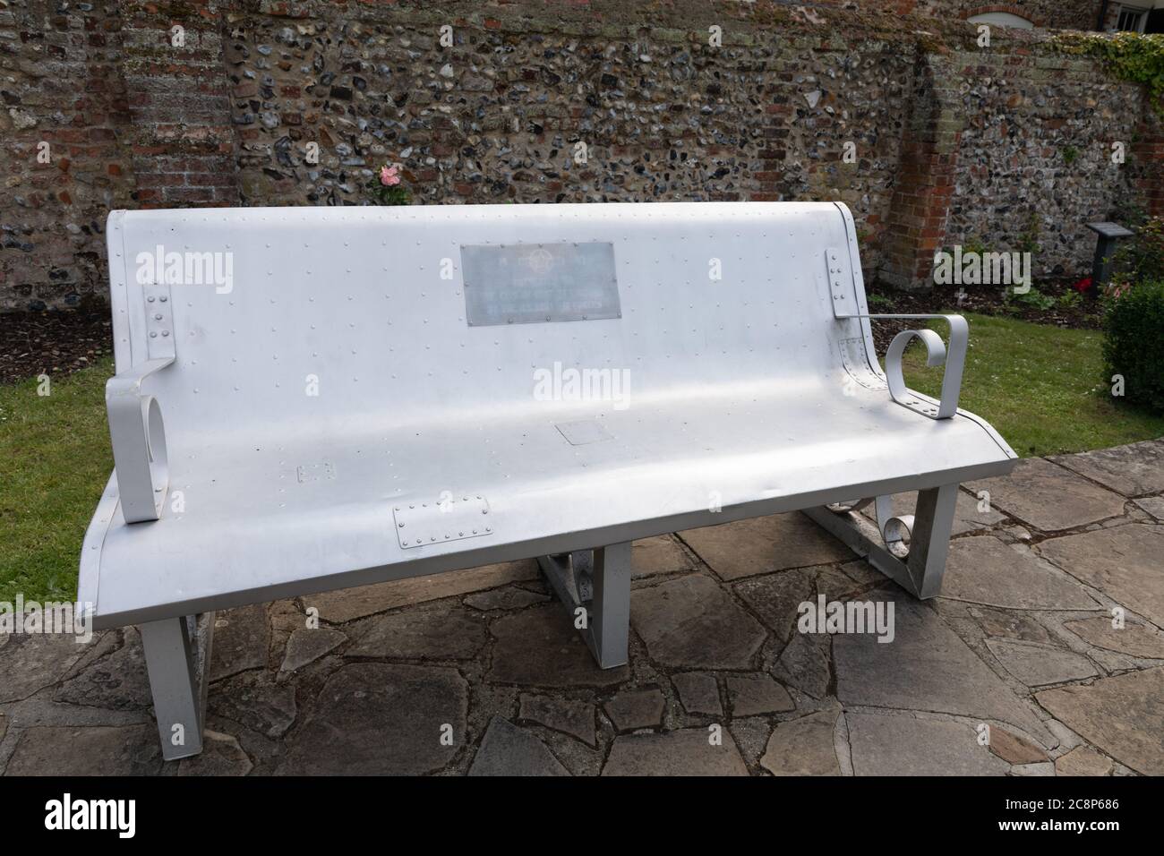 A bench made from the wing of a Mustang plane is a memorial to the ...