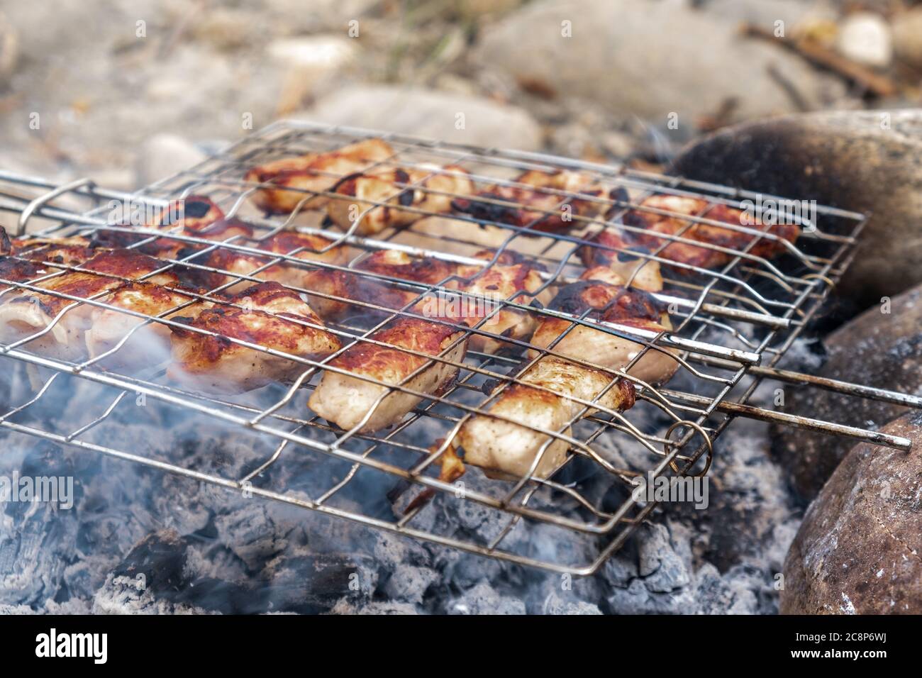 Cooked over fire hi-res stock photography and images - Alamy