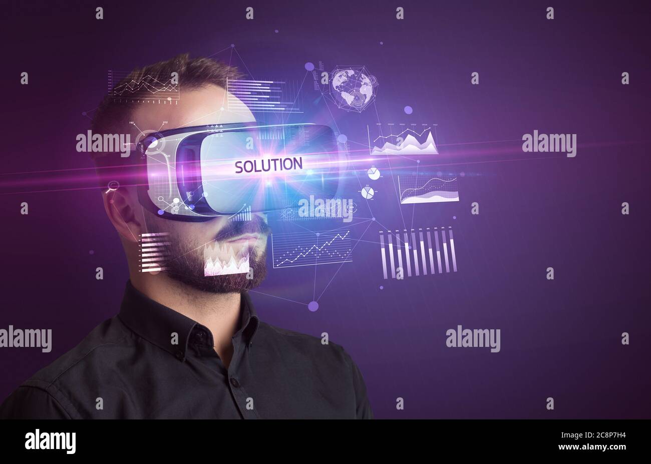 Businessman looking through Virtual Reality glasses with SOLUTION ...