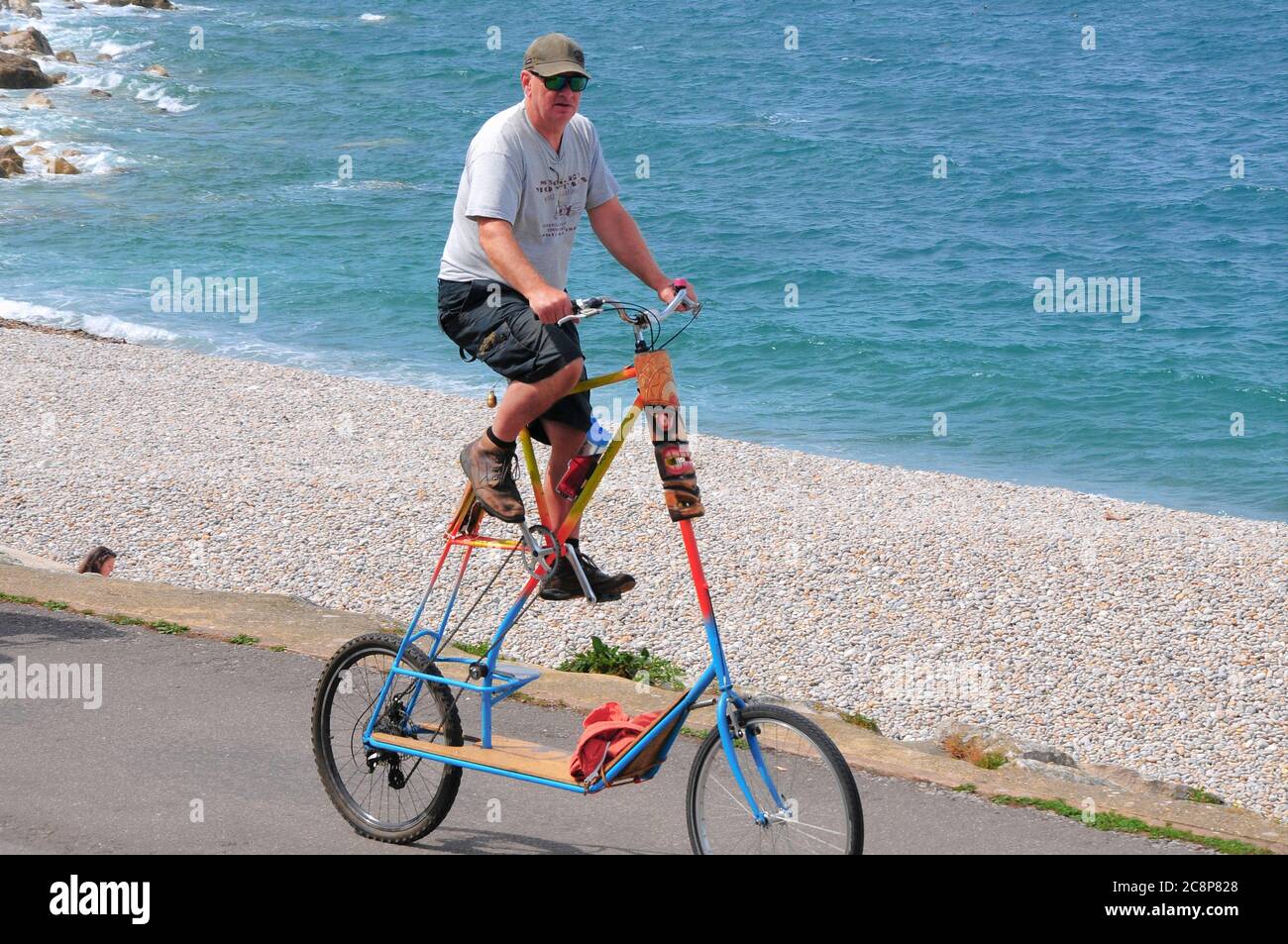 Obese man cycling hi-res stock photography and images - Alamy