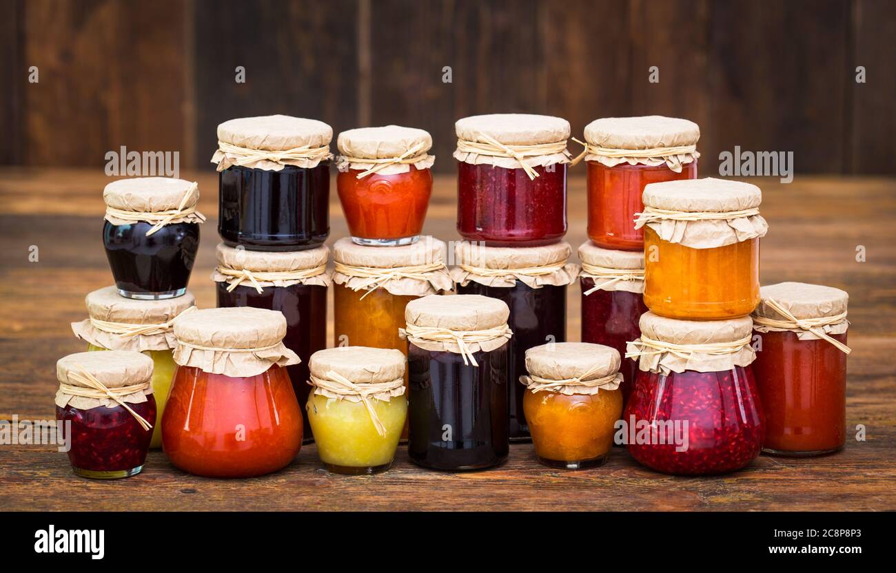 Various homemade fruit jam in the jars Stock Photo - Alamy