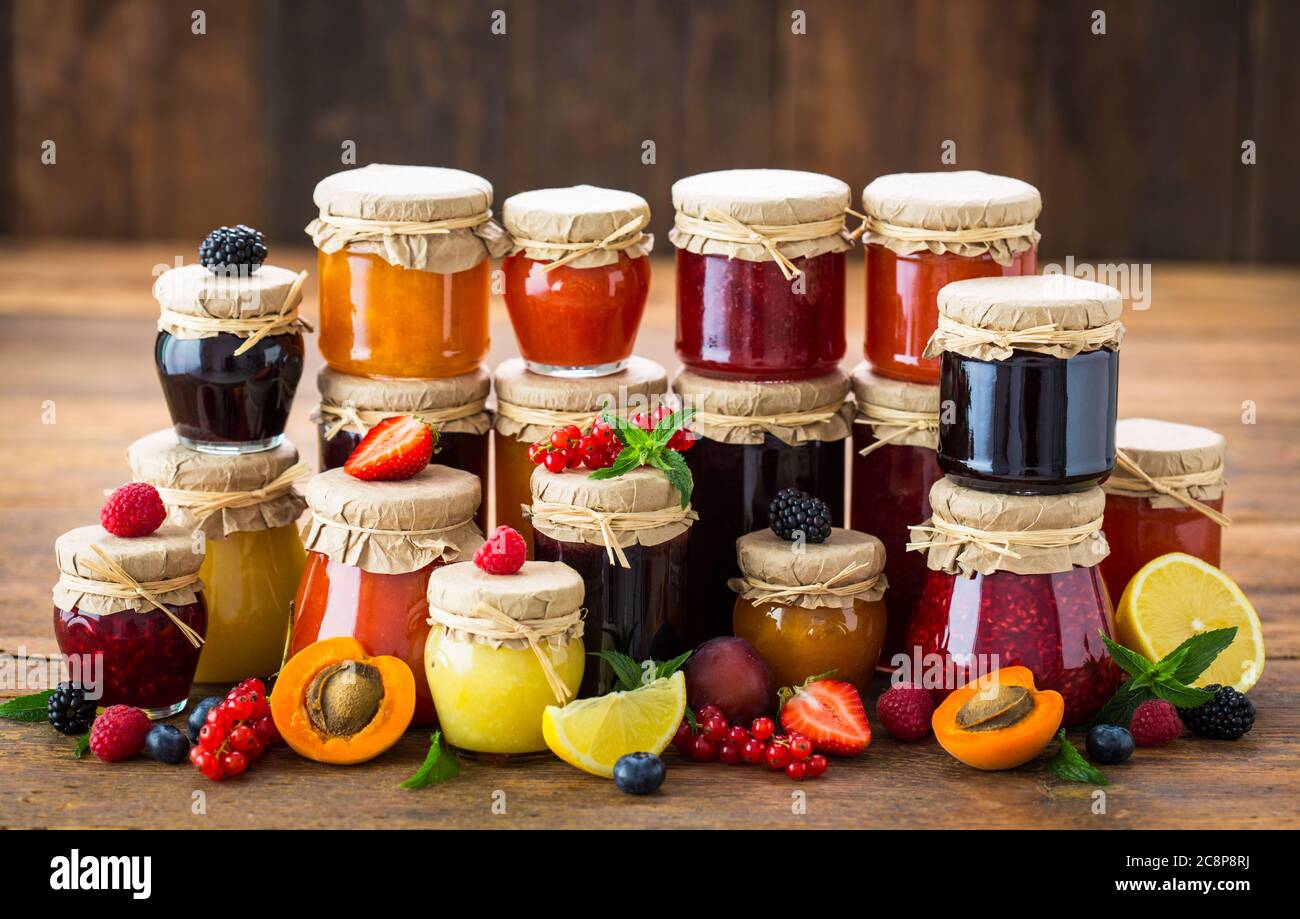 Various homemade fruit jam in the jars Stock Photo - Alamy
