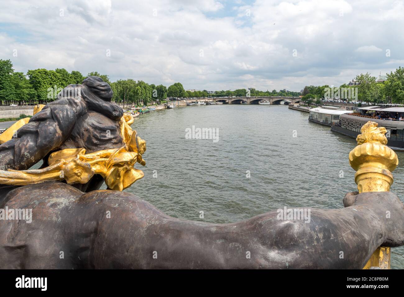 View from the Pont Alexandre Bridge. The bridge is a neo-baroque arch ...