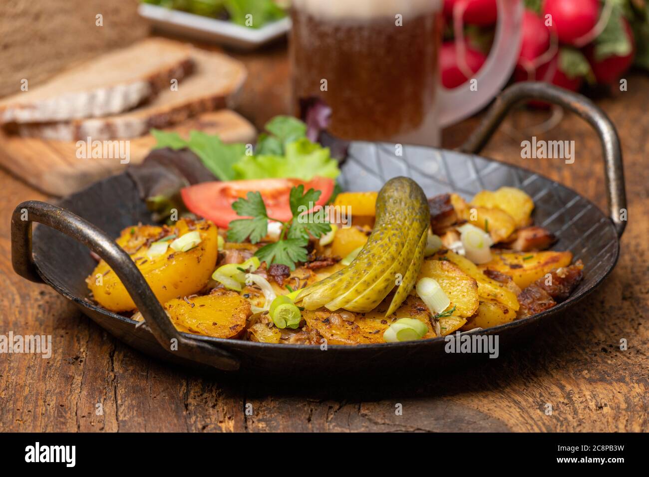 rustic tyrolean groestl on wood Stock Photo - Alamy