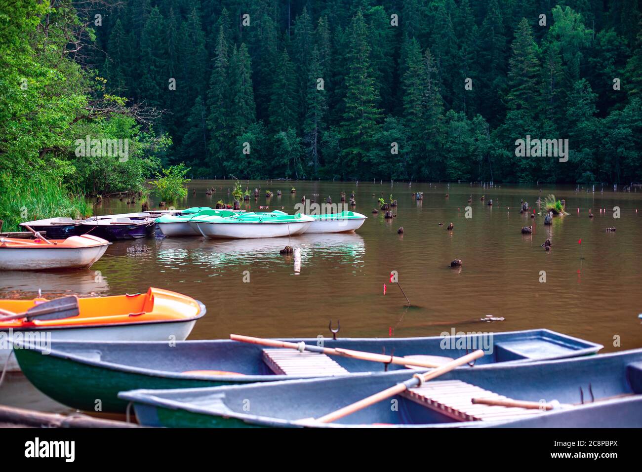 A beautiful view of the Red lake. Bicaz. Carpathians. Romania. Boats ...