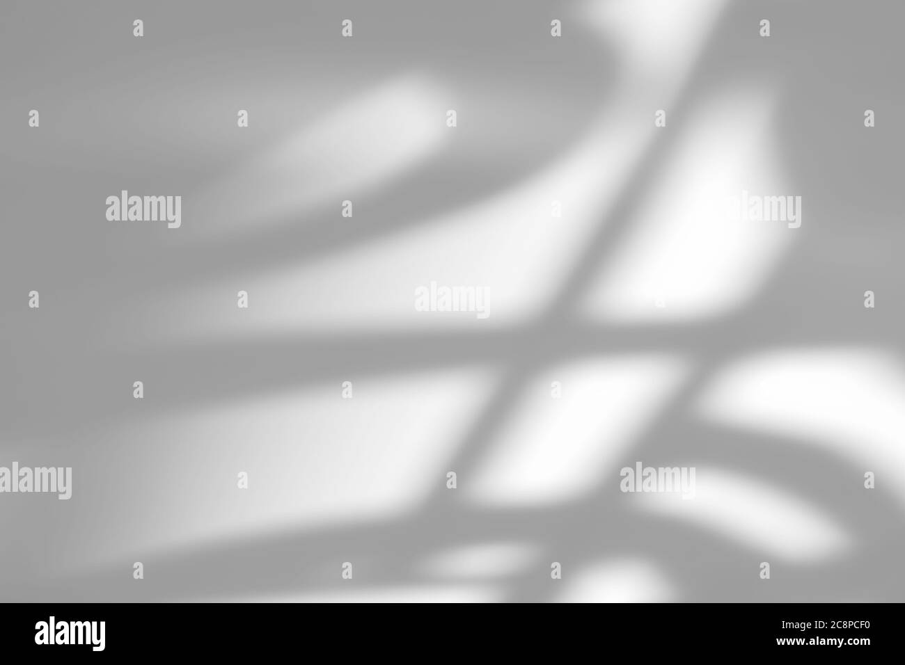 Organic drop shadow on a white wall Stock Photo - Alamy