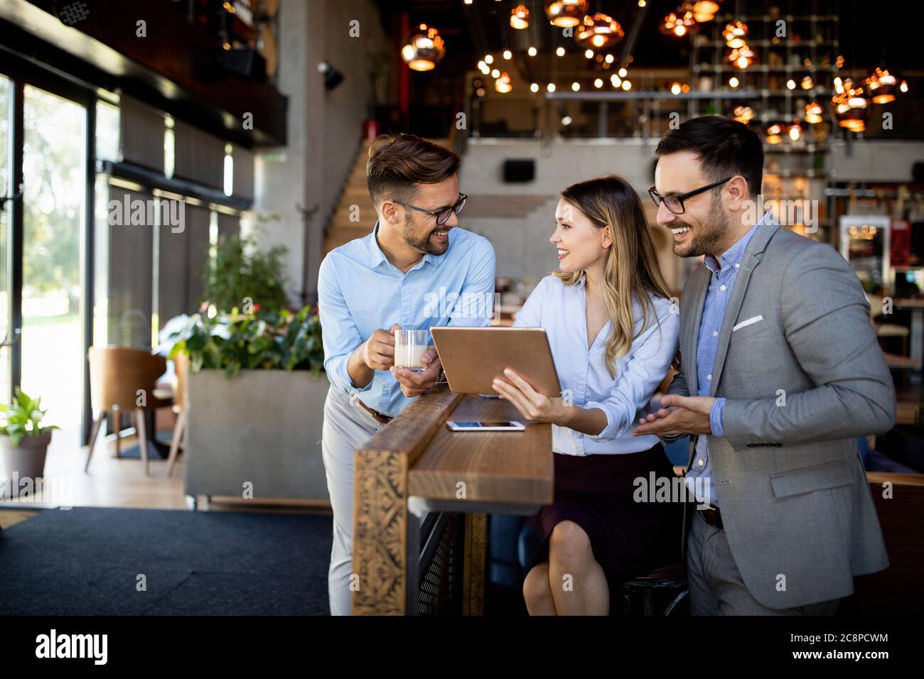 Business colleagues having conversation during coffee break Stock Photo ...