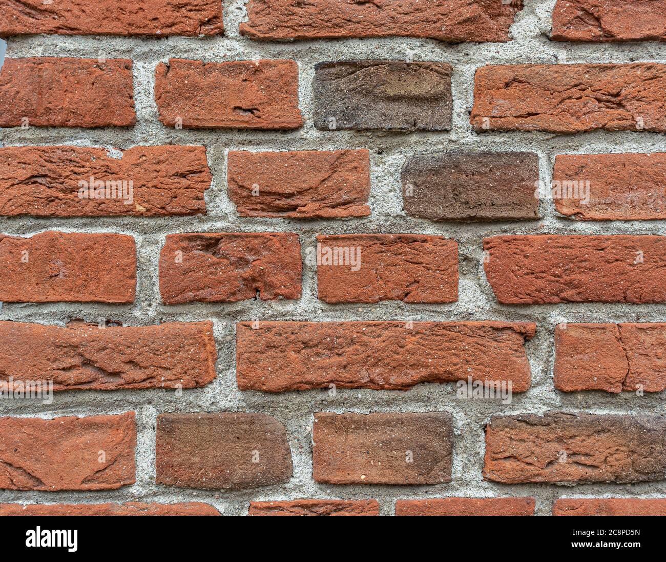 Background old masonry of red brick. Plaster, concrete, cement. Cracks ...
