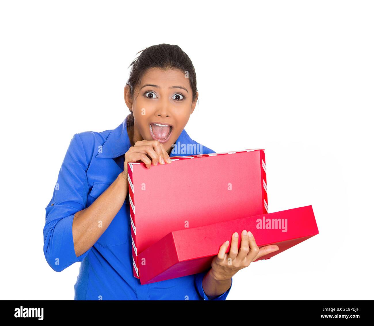 Closeup portrait of a young happy excited woman opening red gift box ...