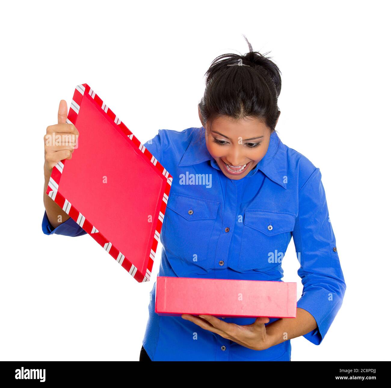 Closeup portrait of a young happy excited woman opening red gift box ...