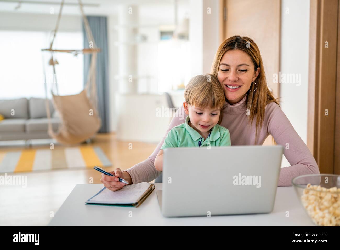 Female mother working home family technology hi-res stock photography ...