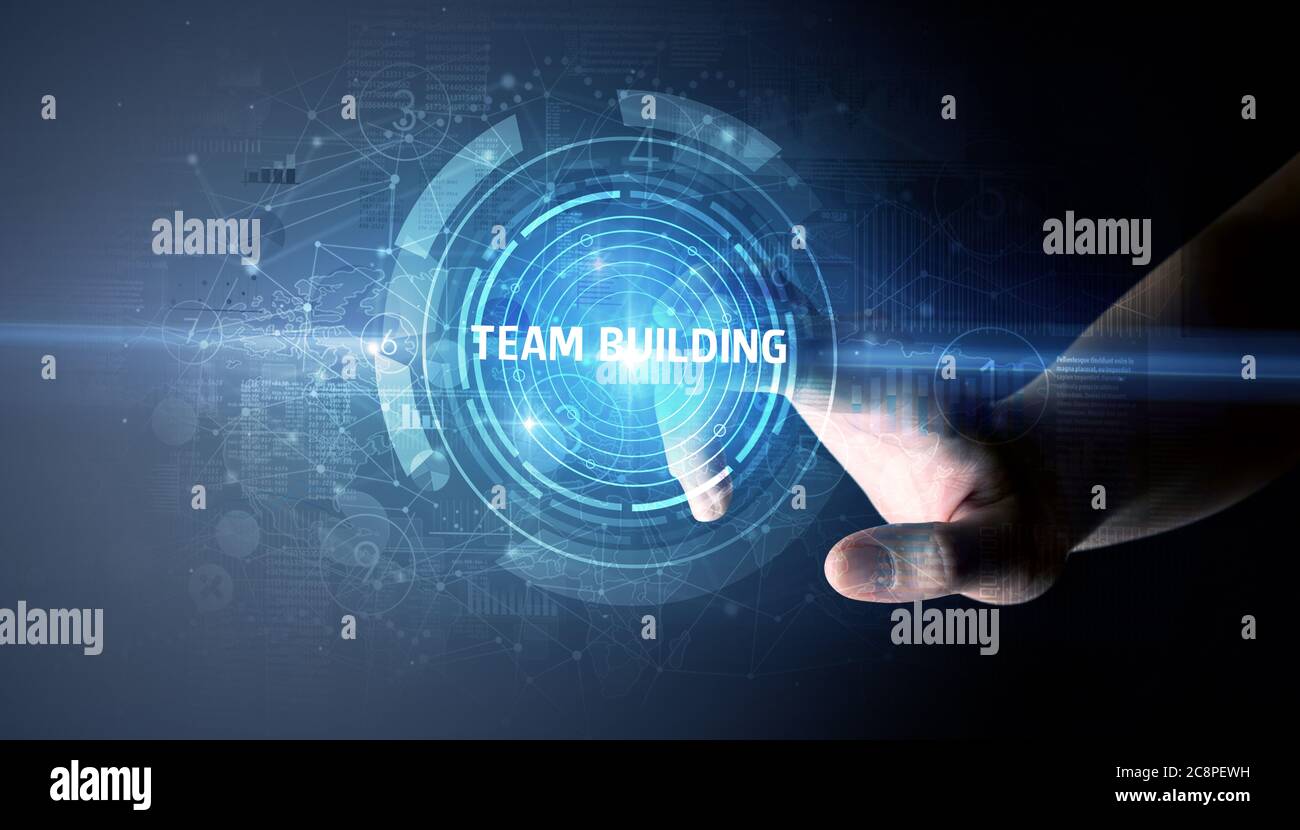Hand touching TEAM BUILDING button, modern business technology concept ...
