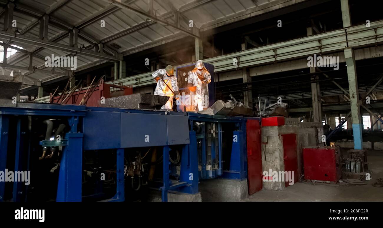 red-hot molten steel in a iron and steel enterprise production scene ...