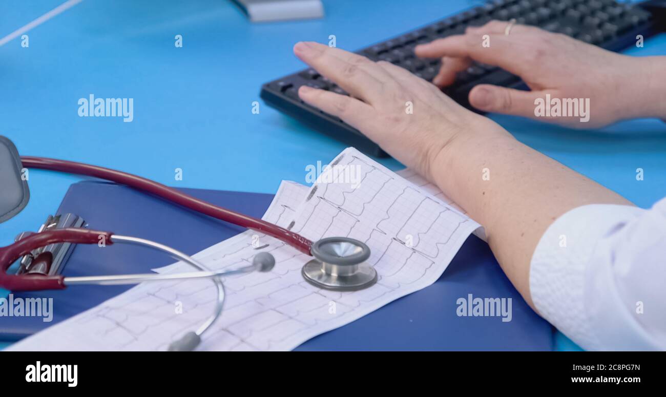 cardiogram measurement device paper tape Stock Photo - Alamy