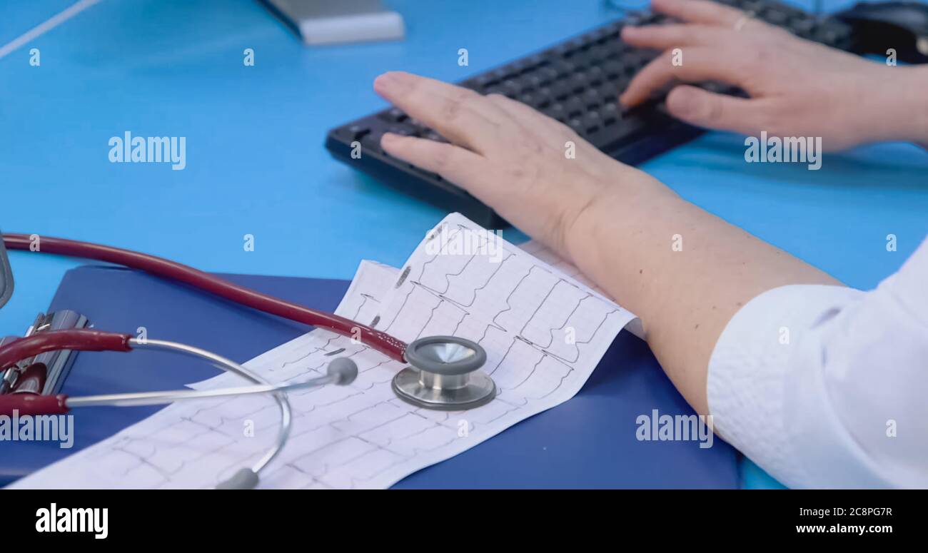 cardiogram measurement device paper tape Stock Photo - Alamy