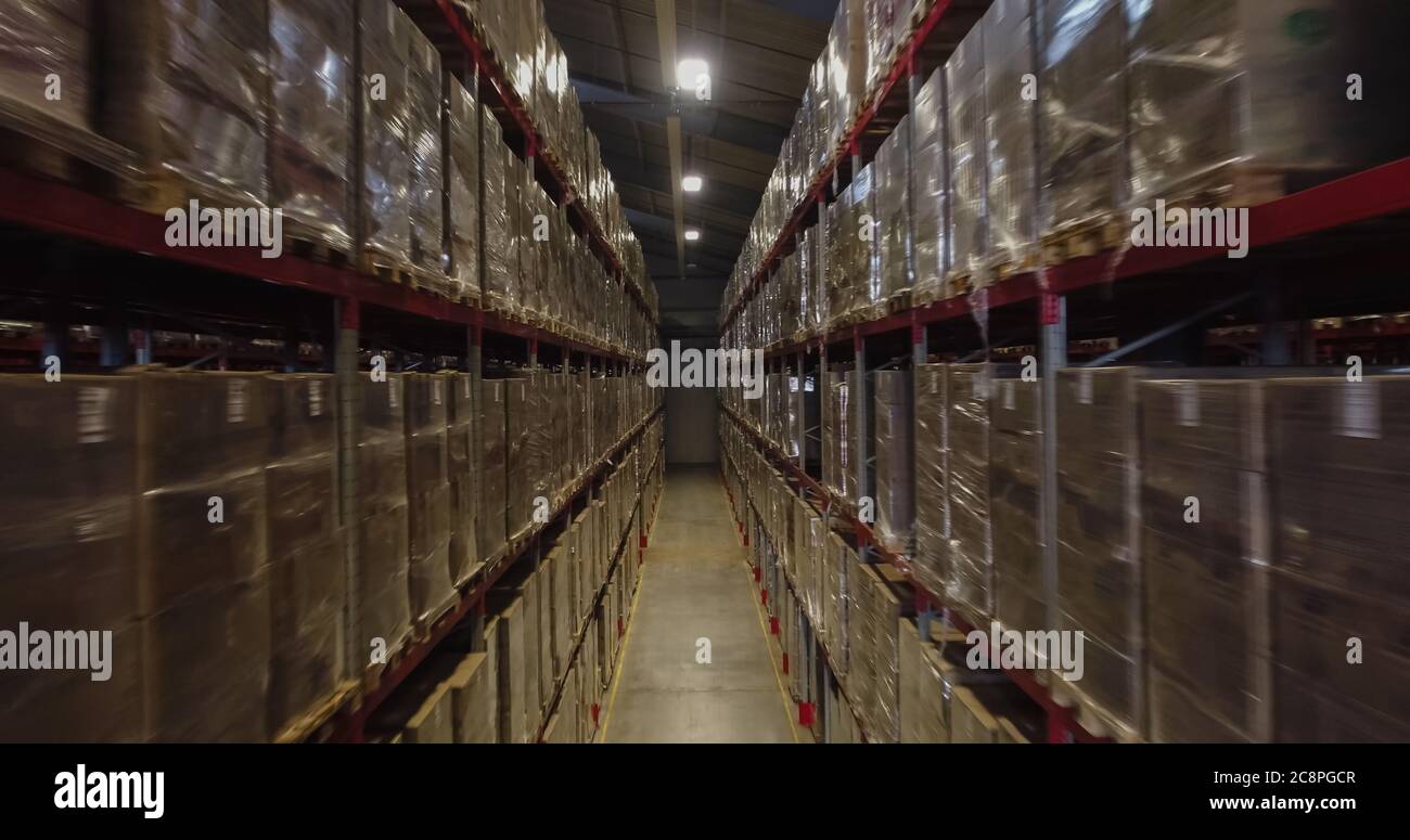 Mobile Aisle Racking System in Distribution Warehouse Stock Photo - Alamy