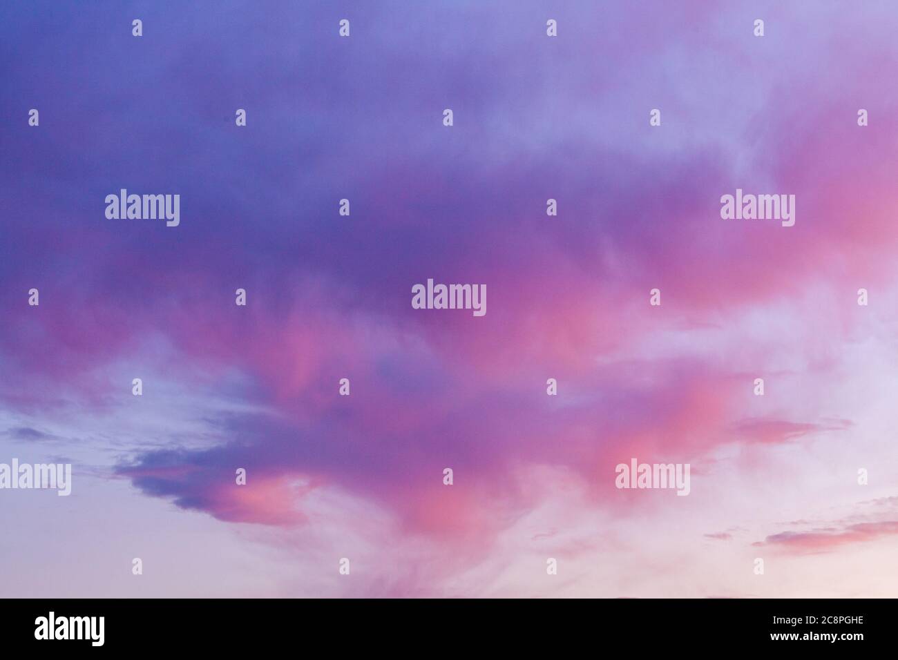 Pink sunset sky and clouds in early morning landscape Stock Photo - Alamy