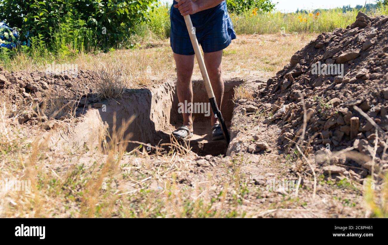 Dig Grave Shovel High Resolution Stock Photography and Images - Alamy