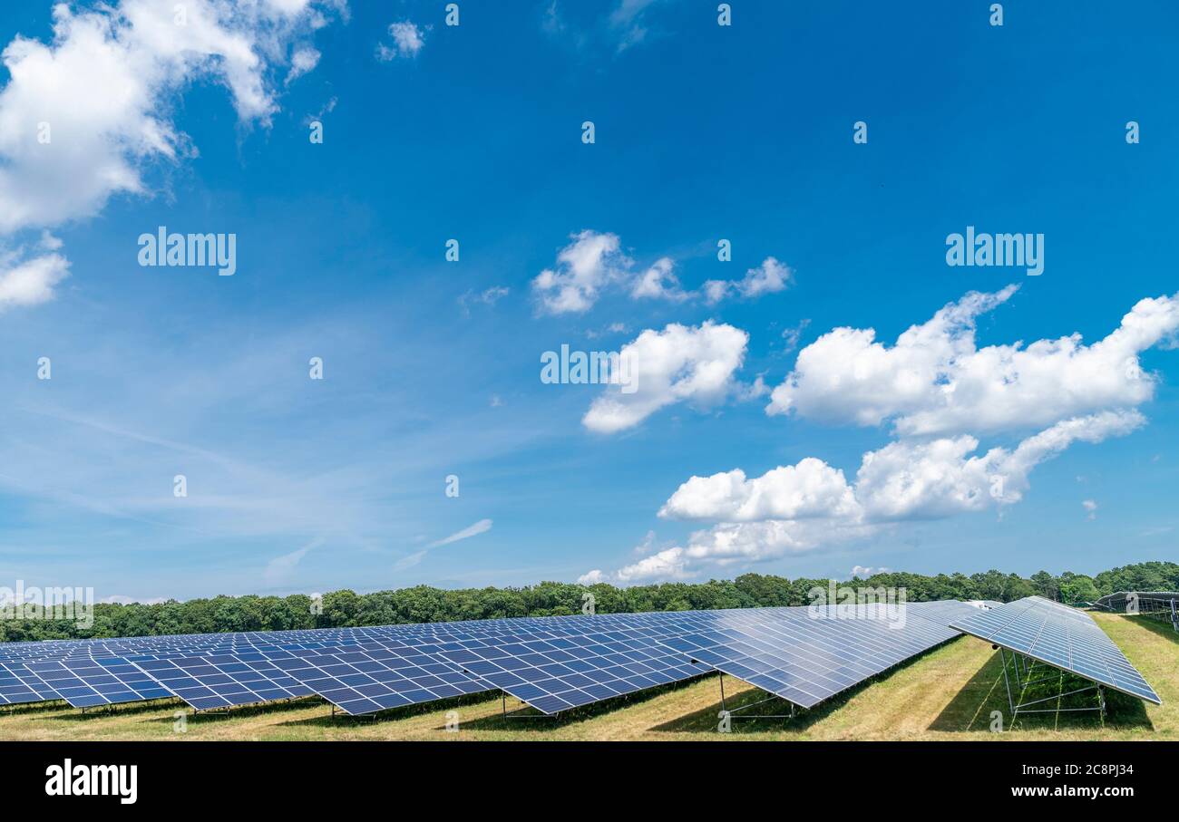 Solar photovoltaic power plant farm installation Stock Photo - Alamy