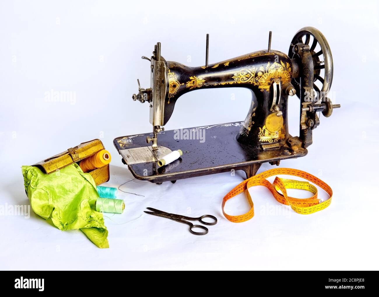 Old, historical sewing machine, sissers and equipment Stock Photo - Alamy