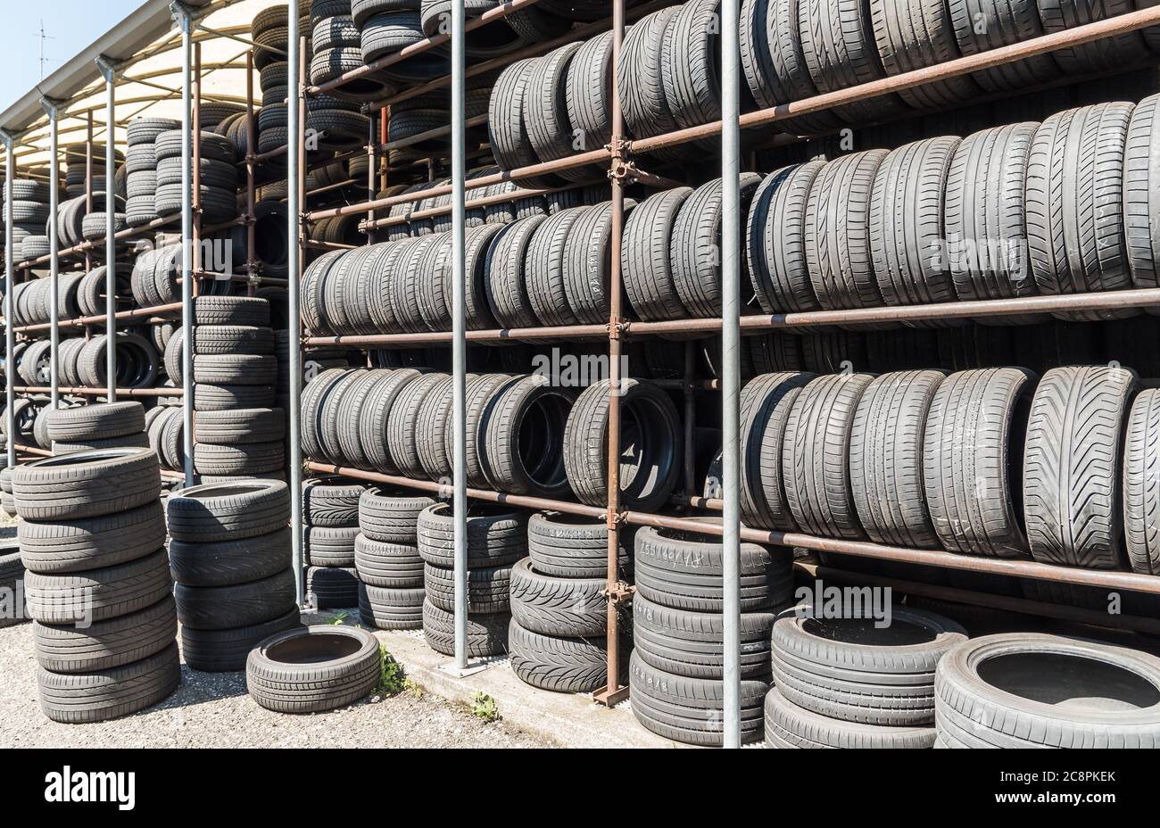Varese, Italy - May 20, 2016: Stack of used tires in a car garage of ...
