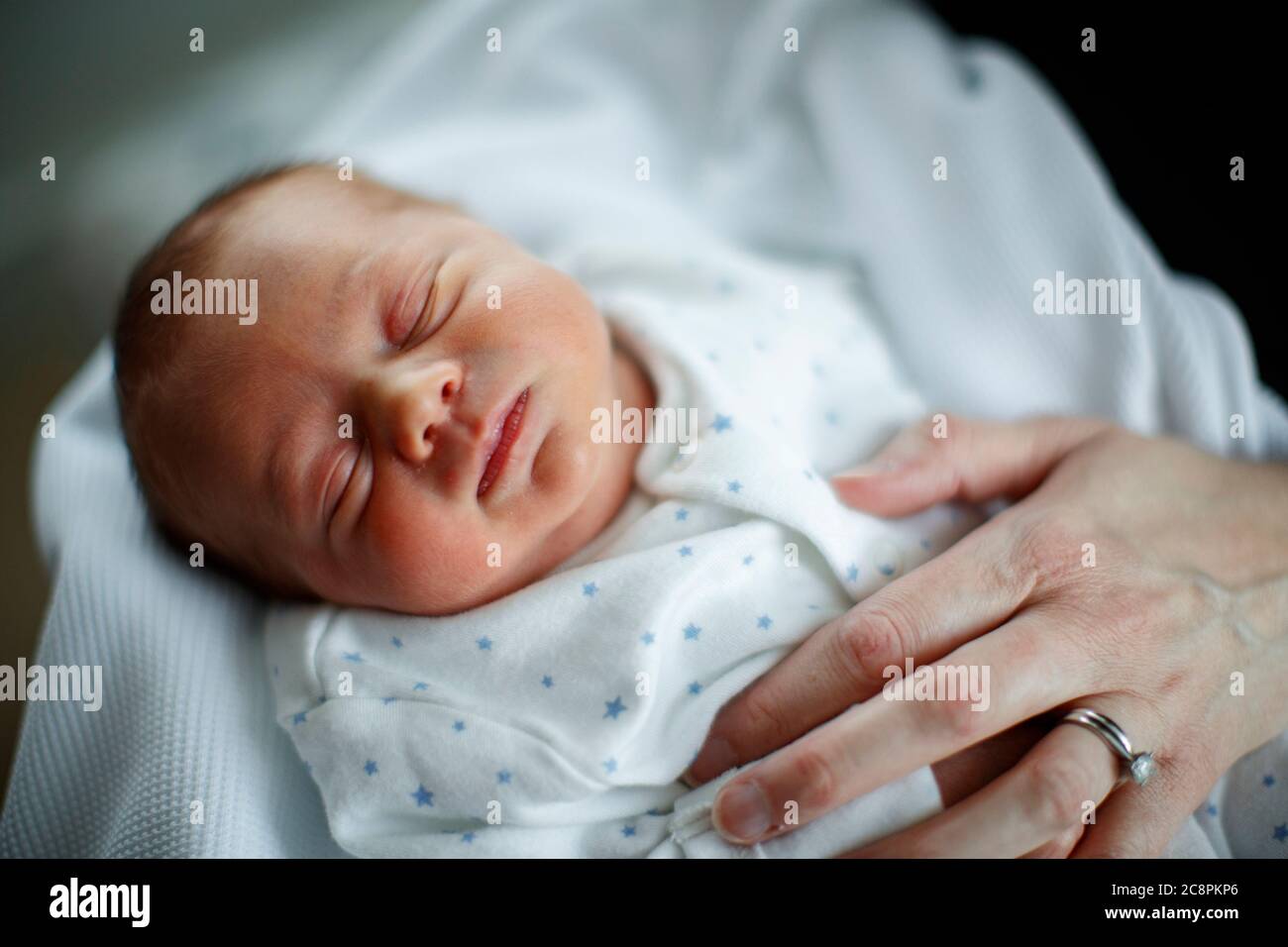Child with hand on chest hi-res stock photography and images - Alamy